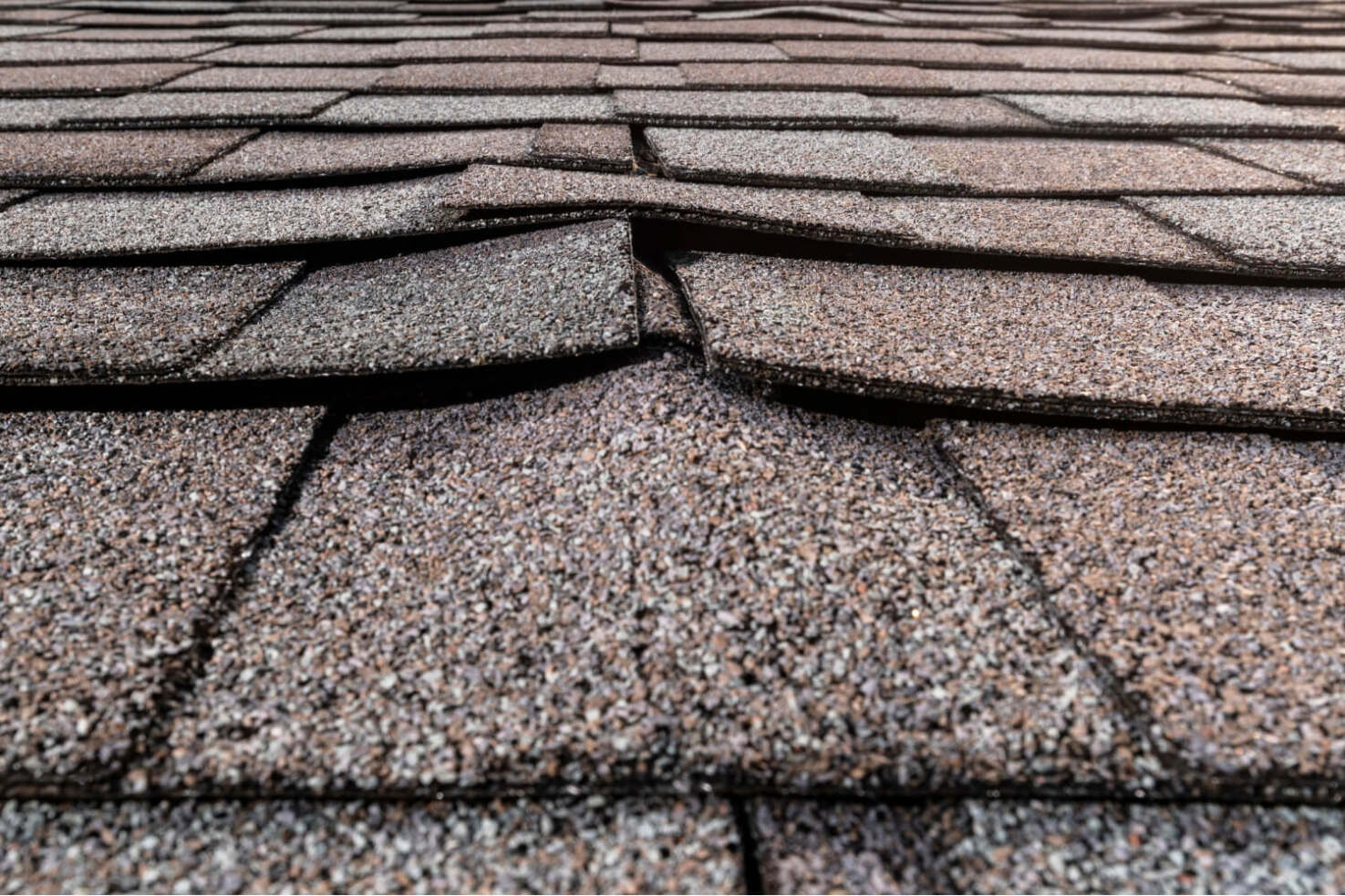 Shingle Buckling: Causes And Effective Fixes | Arocon Roofing And ...